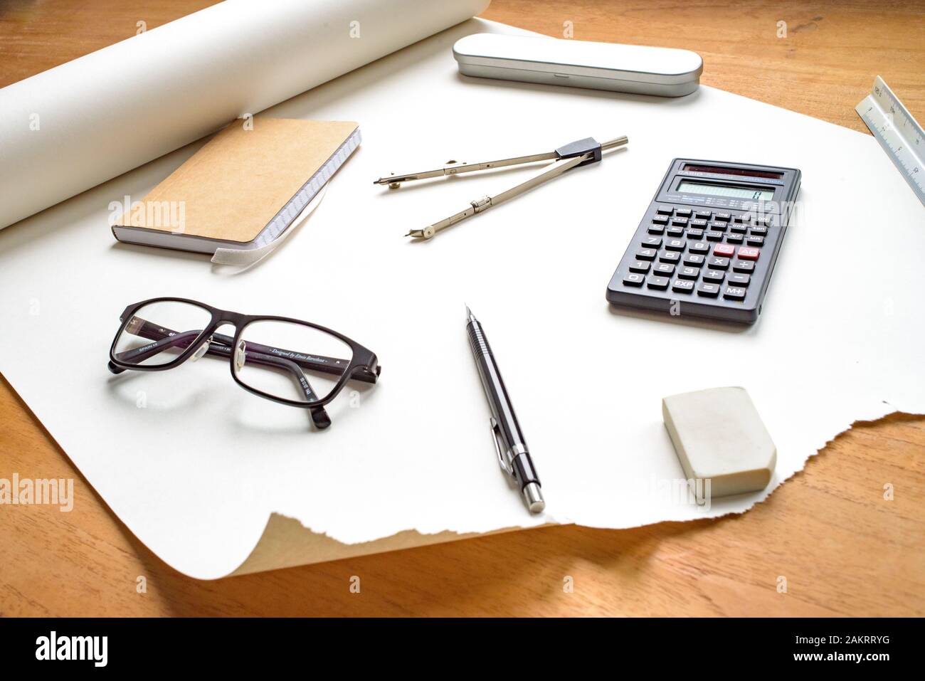 Perspective view on technical drawing setup, with pencil, compass ...