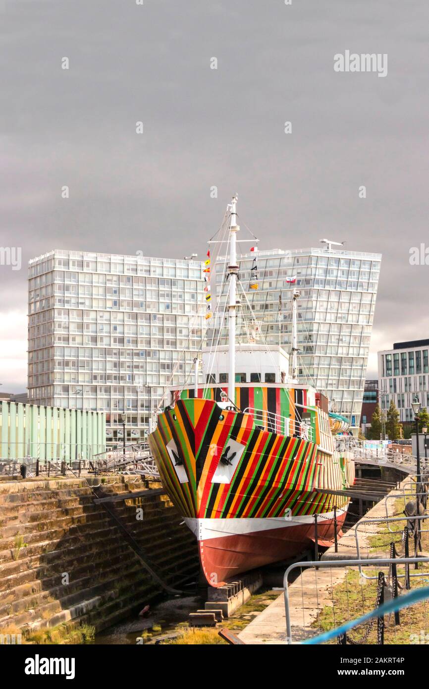 Mersey ferry with bright dazzle paint scheme in dry dock in Liverpool ...