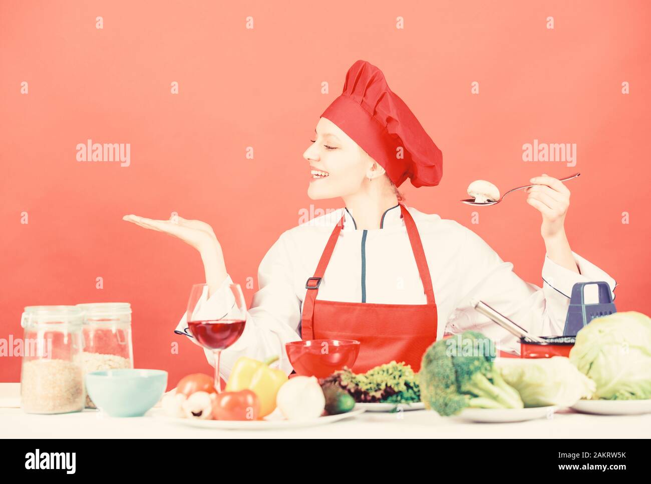 Cooking meal. Woman chef try taste eat food. Delicious recipe concept ...