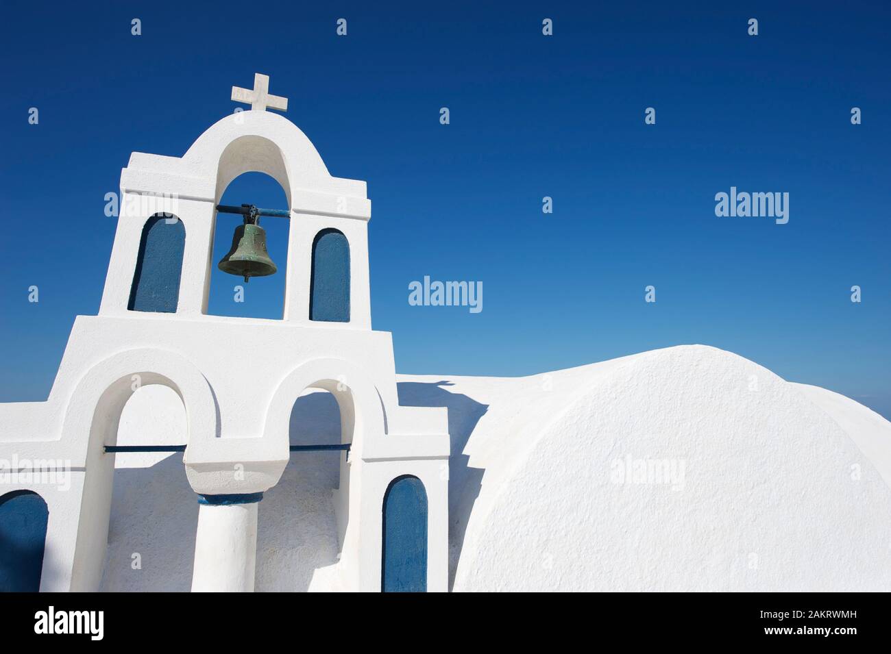 Traditional white stucco Greek island church bell tower standing ...