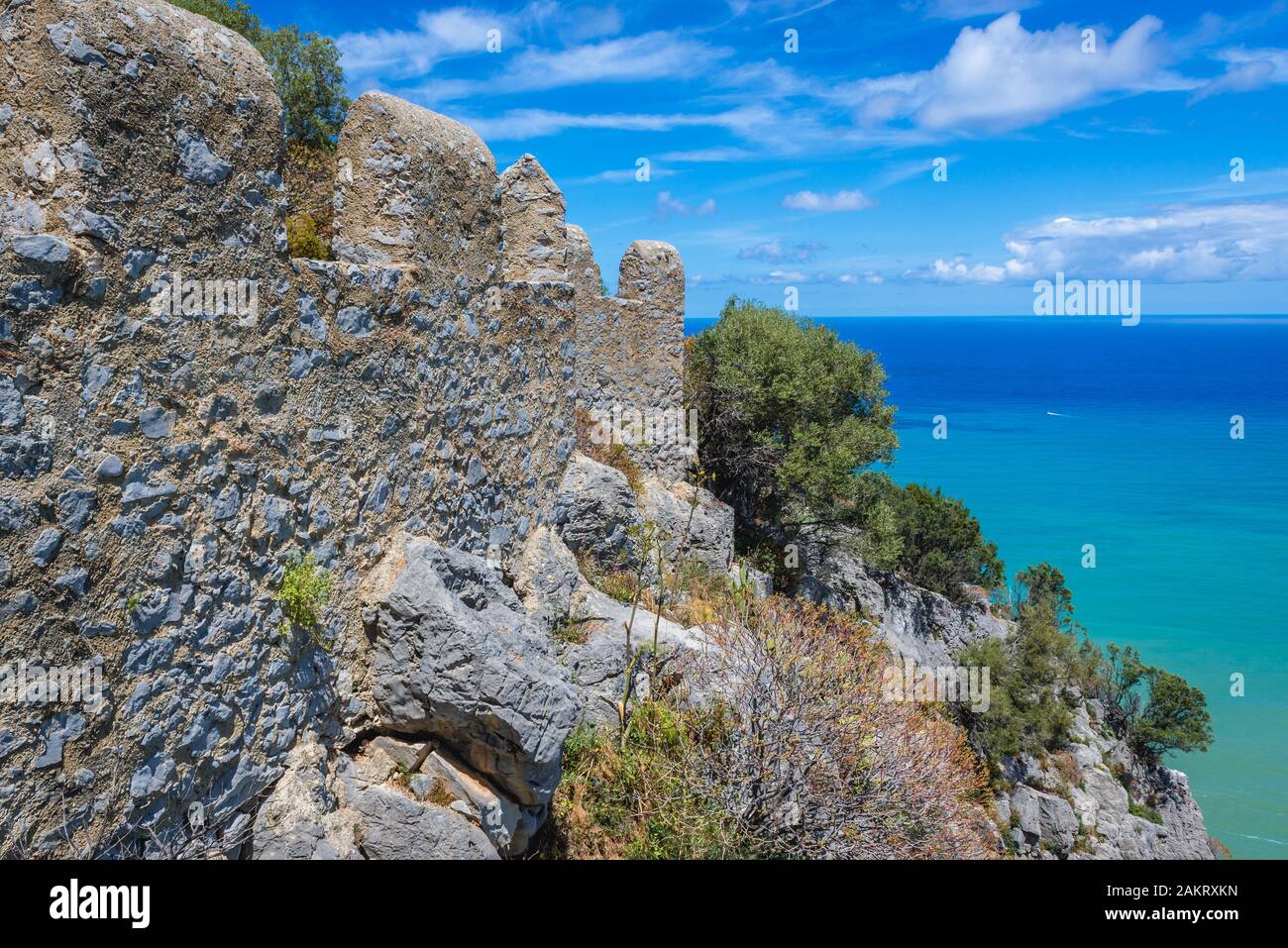Historic walls of fortress on the top of Rocca di Cefalu rock massif in ...