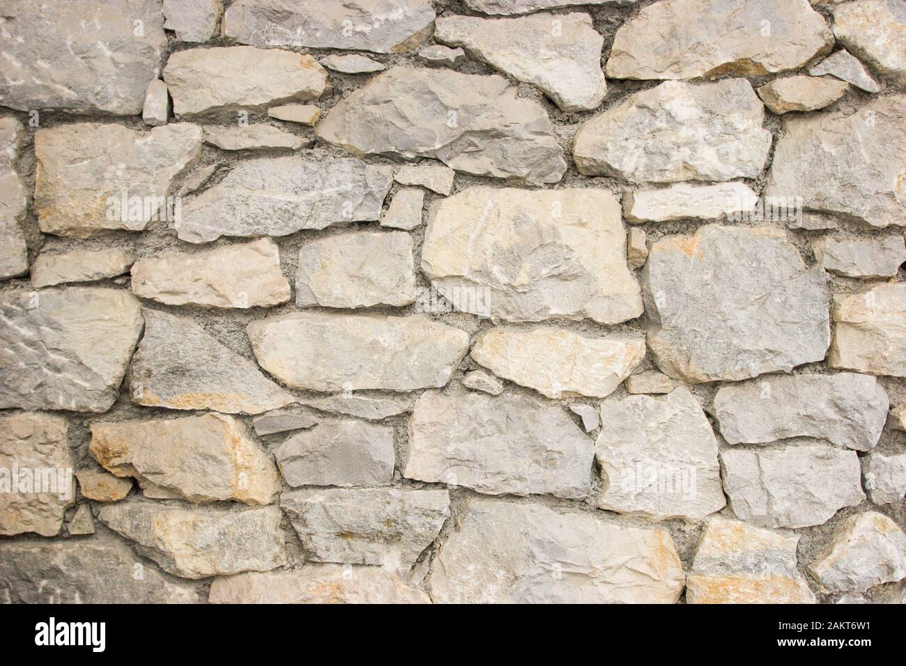 Stone tile wall pattern background Stock Photo - Alamy