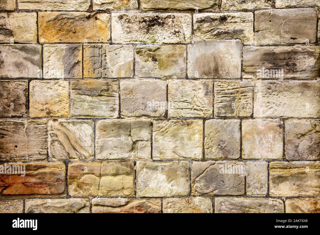 Medieval stone wall background Stock Photo - Alamy