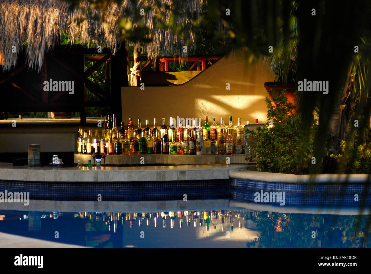 Bar by a swimming pool in a resort in Riviera Maya, Mexico Stock Photo ...