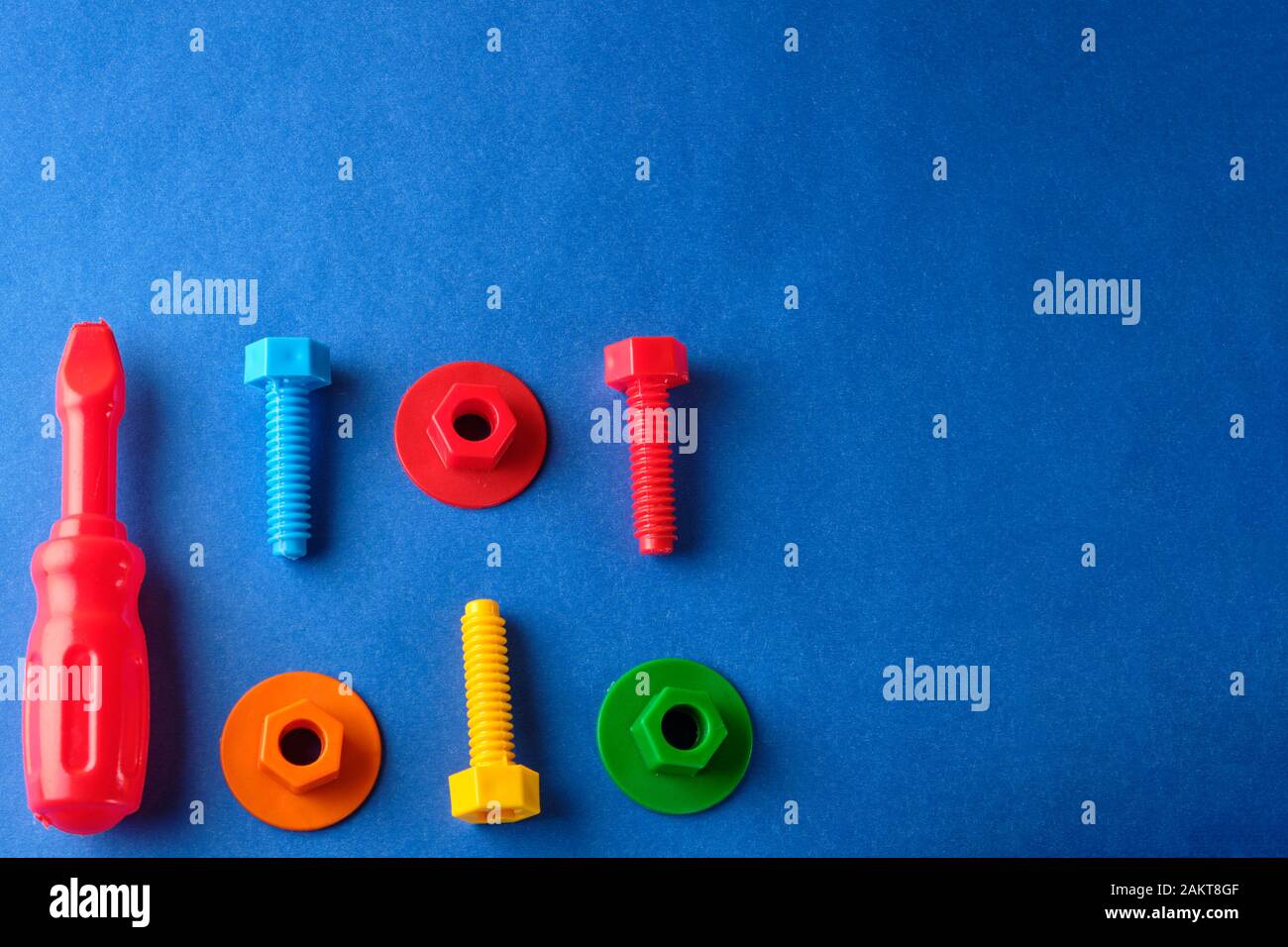Toy tools set at blue background with copy space Stock Photo - Alamy