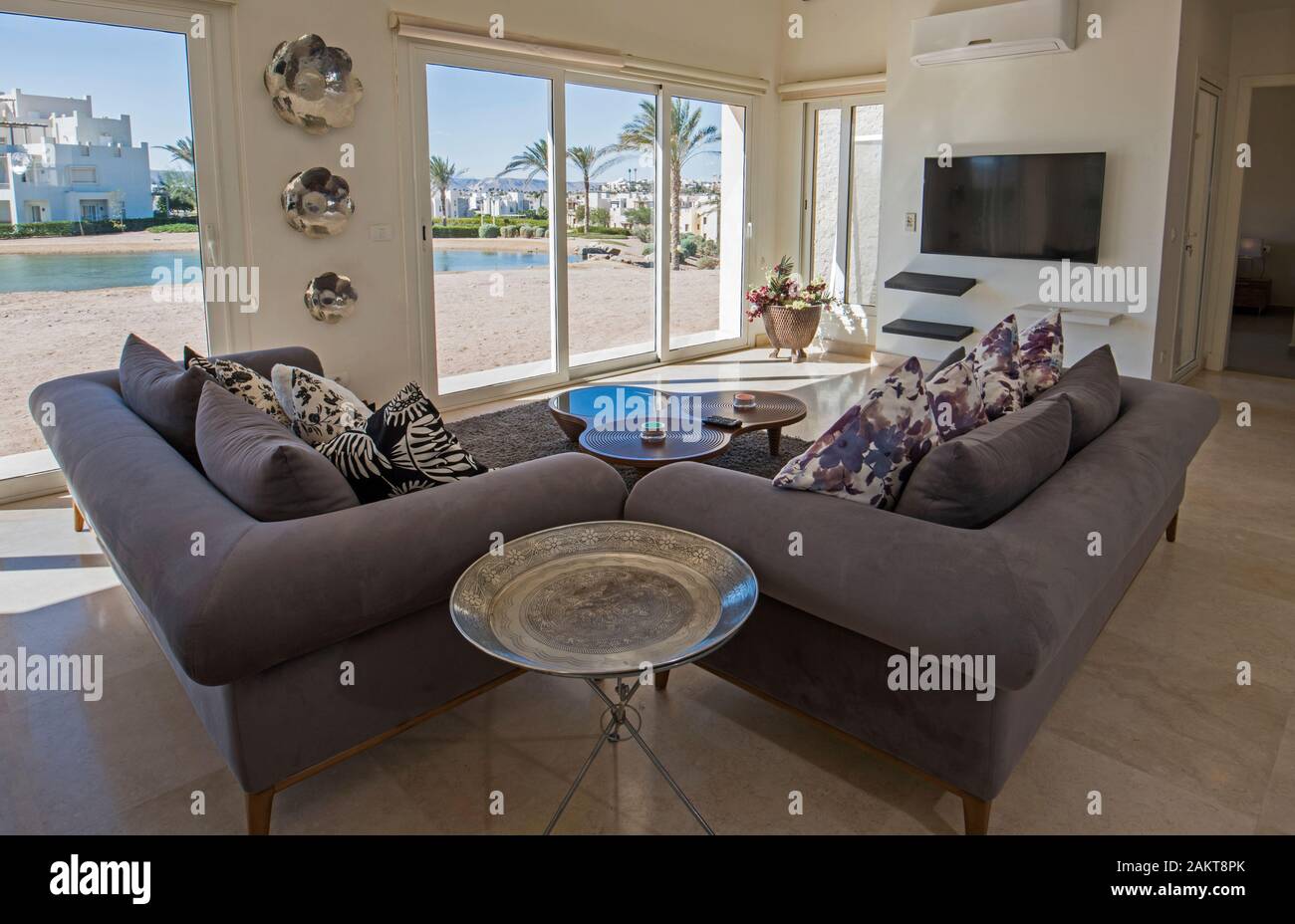 Living room lounge in luxury holiday villa show home showing interior ...