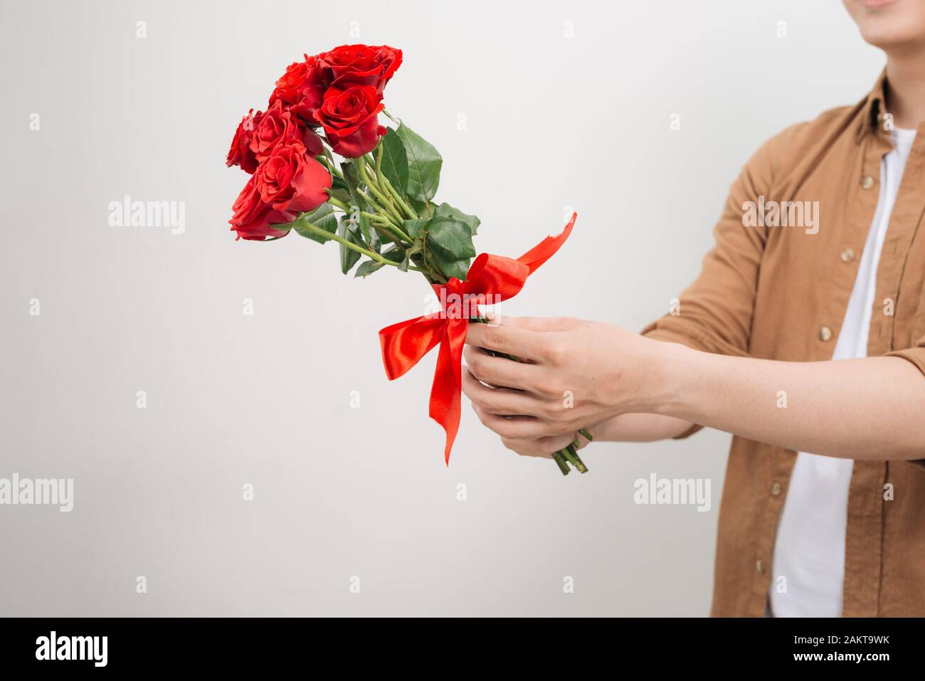 Man giving roses happy hi-res stock photography and images - Alamy