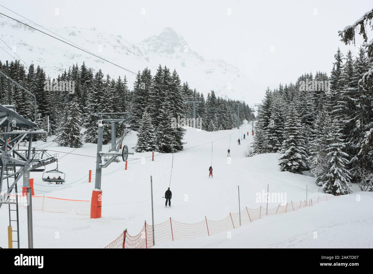 Platter lift with skiers at Meribel ski resort, France Stock Photo - Alamy