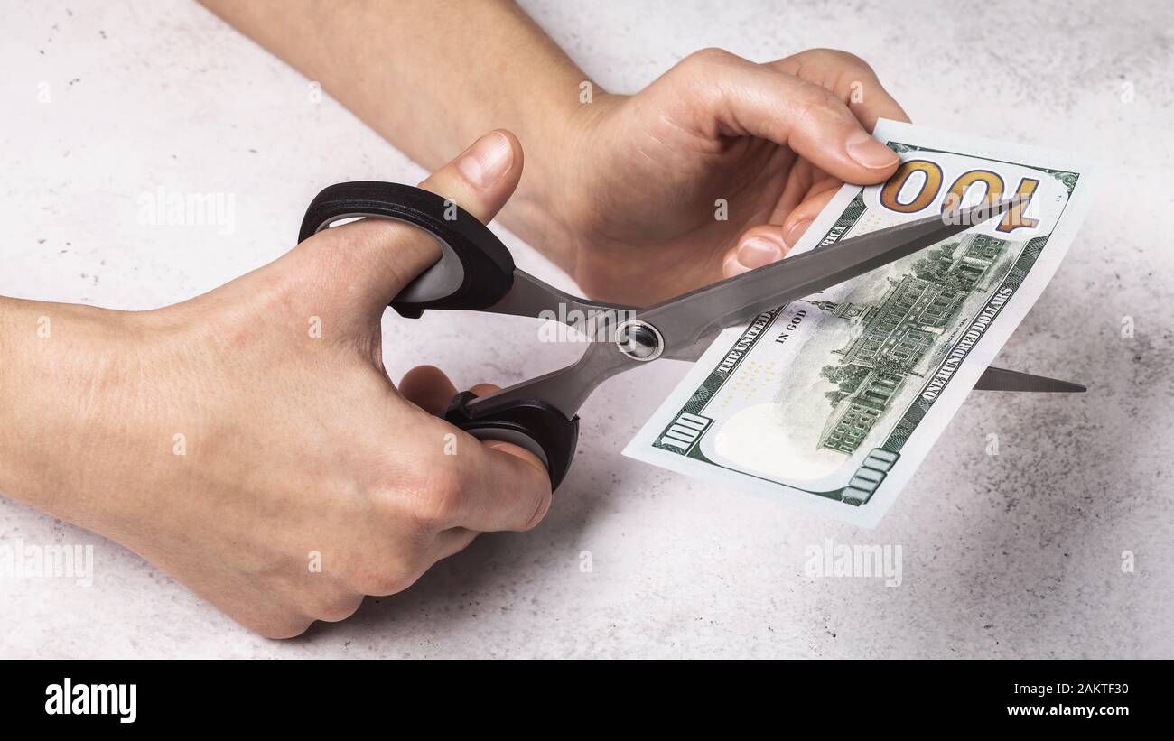 Cutting Dollar Sign High Resolution Stock Photography and Images - Alamy