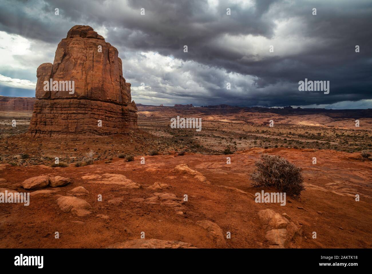 Late afternoon storms roll over the desert landscape in Arches National ...