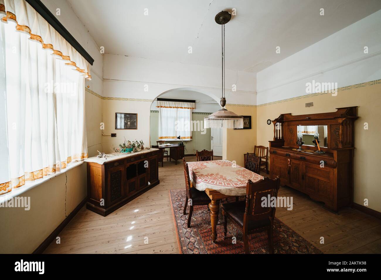 Interior of a colonial living room with table and furnitures Stock ...