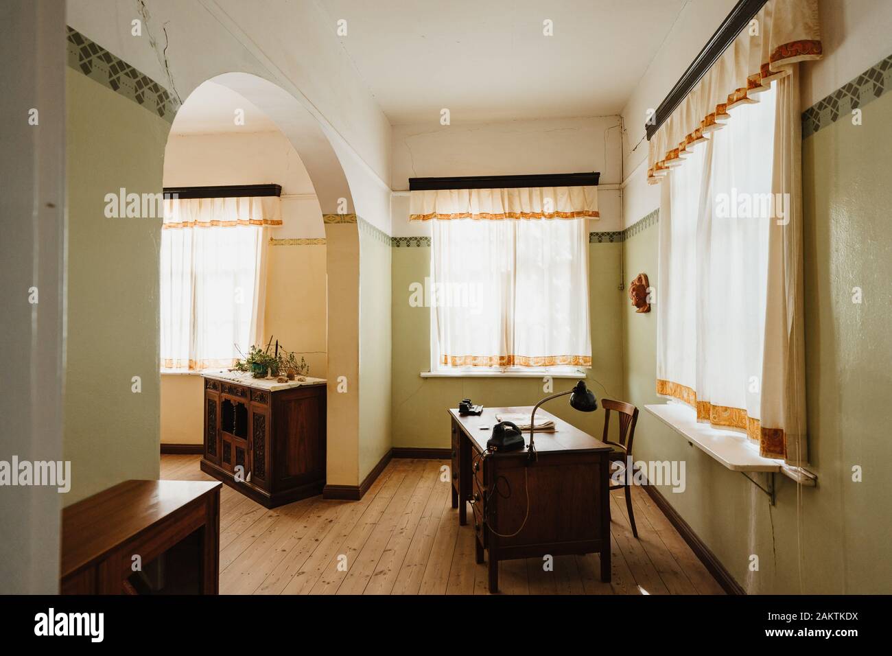 Interior of a colonial living room with table and furnitures Stock ...