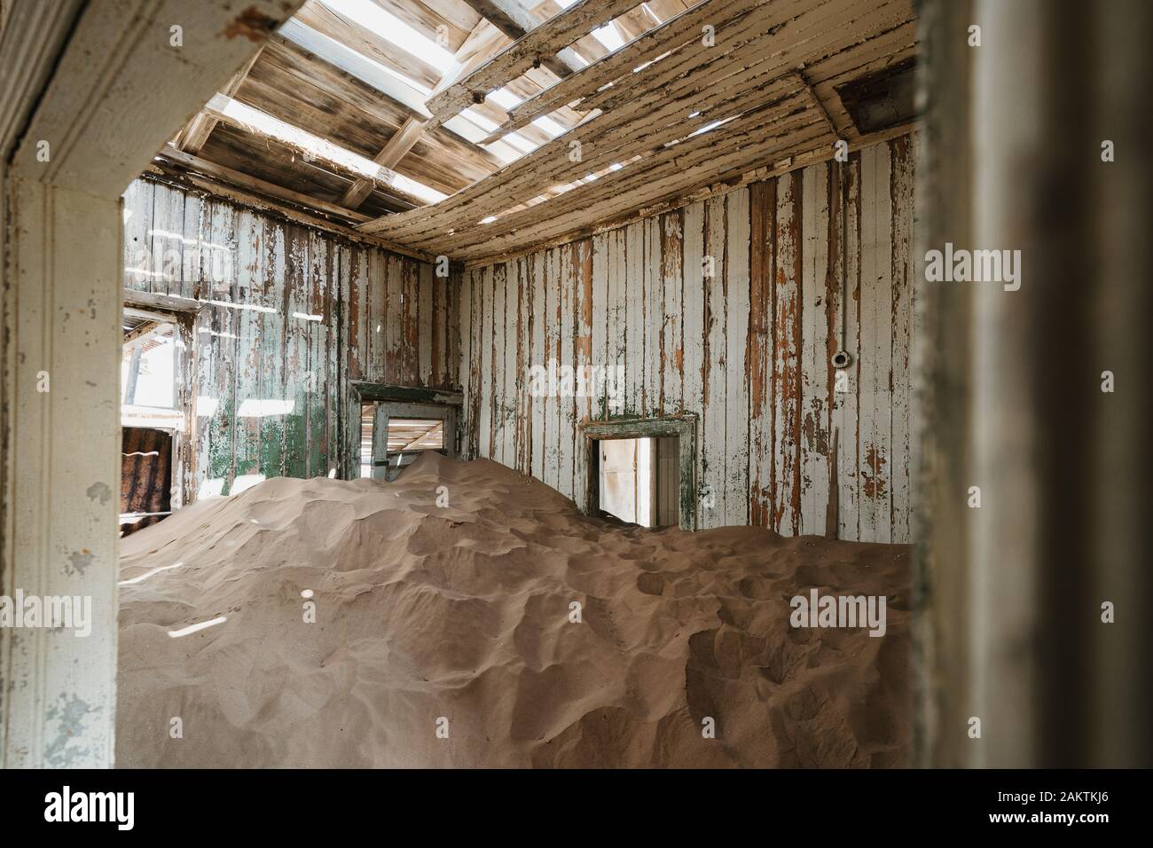 Desert sand entering old abandoned building and decay Stock Photo - Alamy