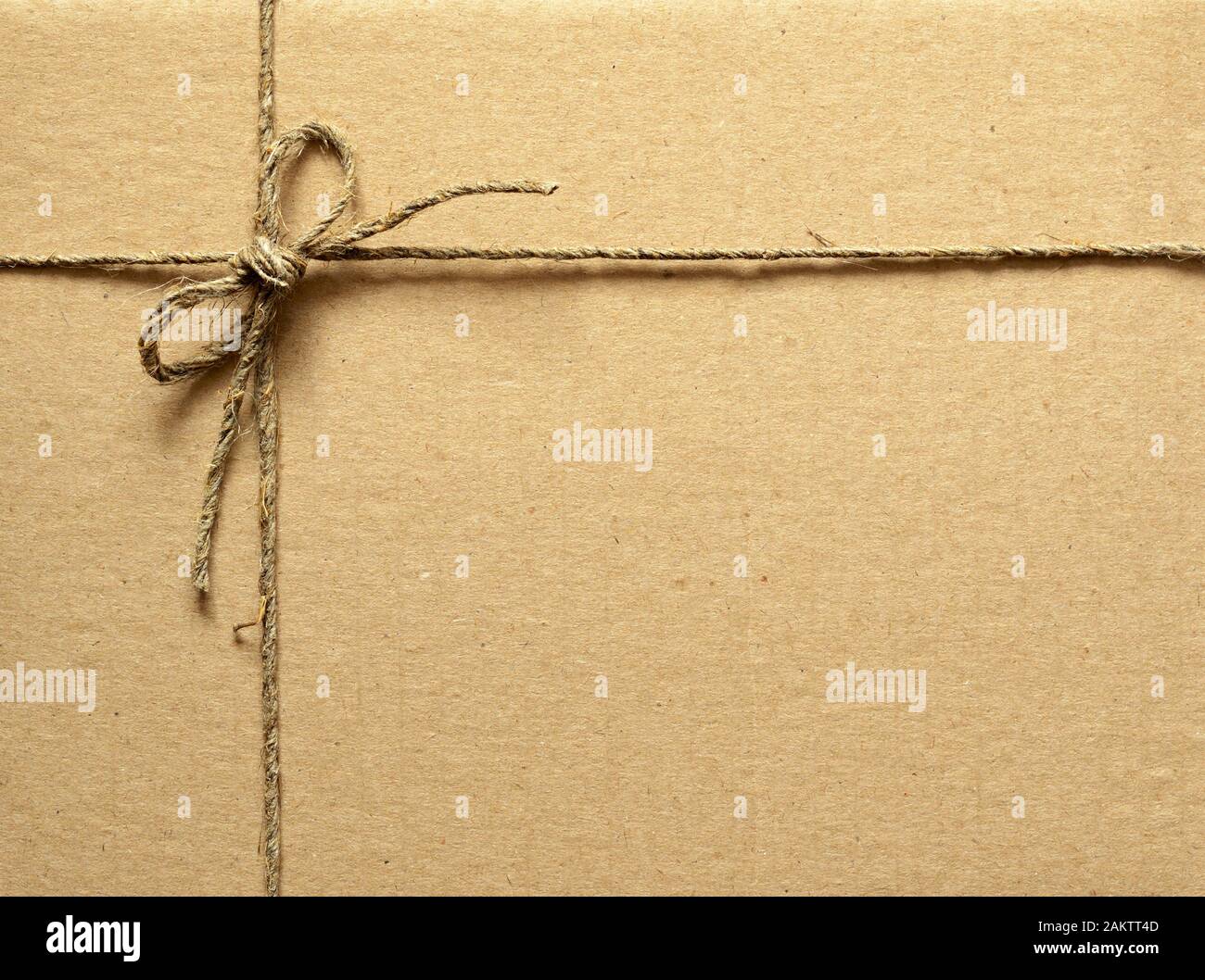 Gift box tied rope hi-res stock photography and images - Alamy
