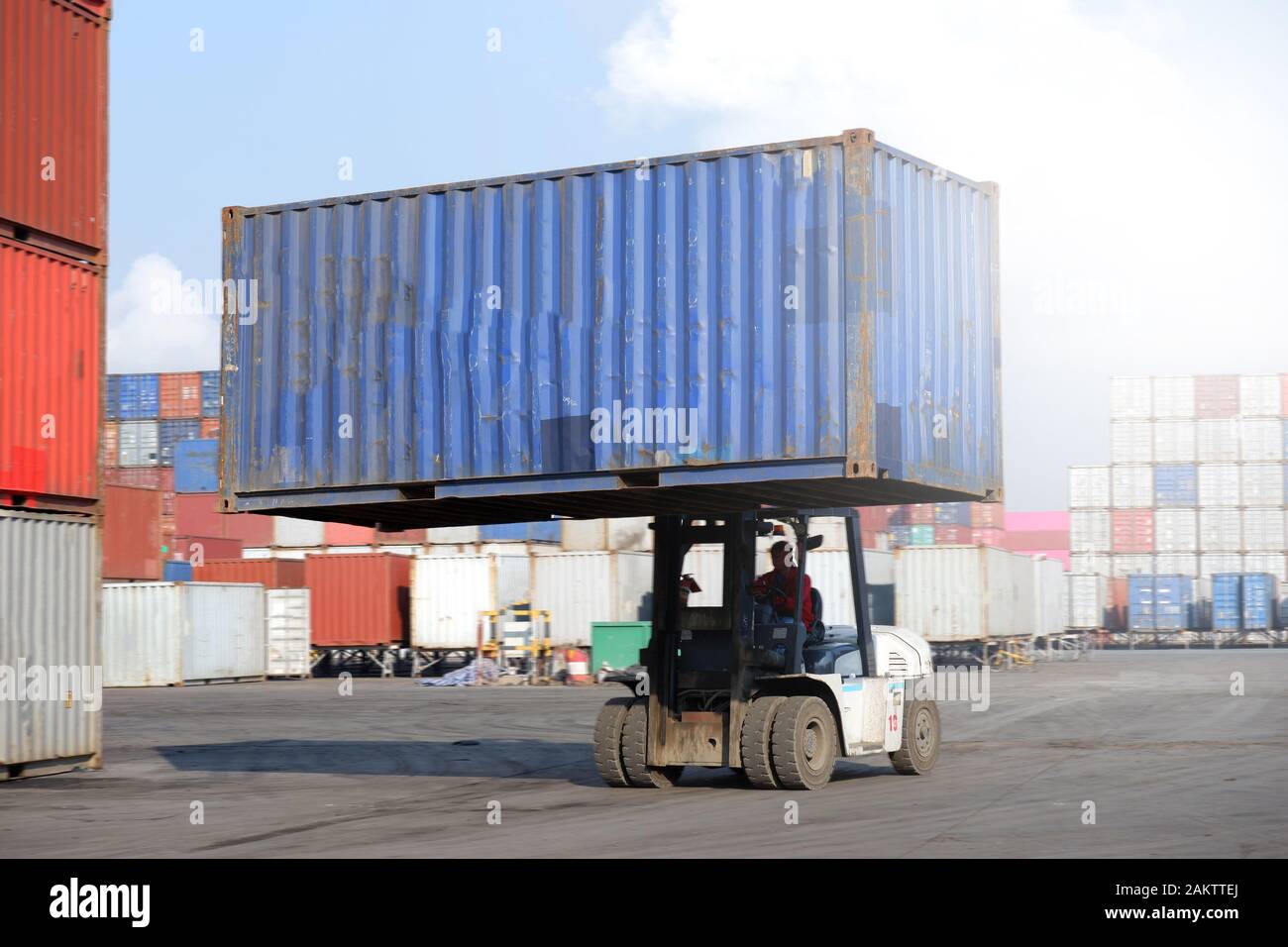 Container handlers in the harbor, transportation concepts Stock Photo ...