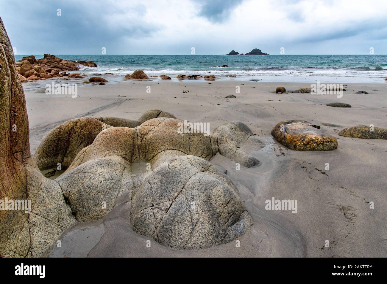 Rocks on the beach at Port Nanven, St Just, Cornwall, UK. The Brisons ...