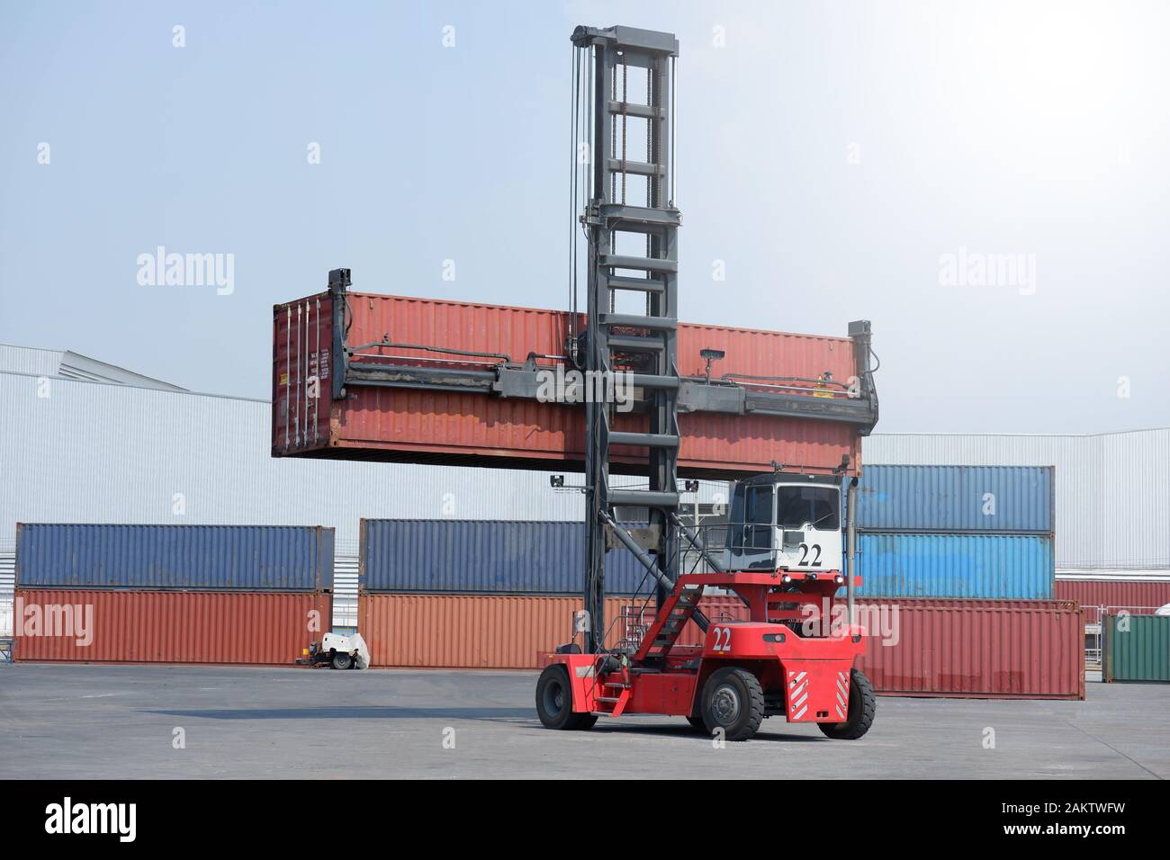 Container handlers in the harbor, transportation concepts Stock Photo ...