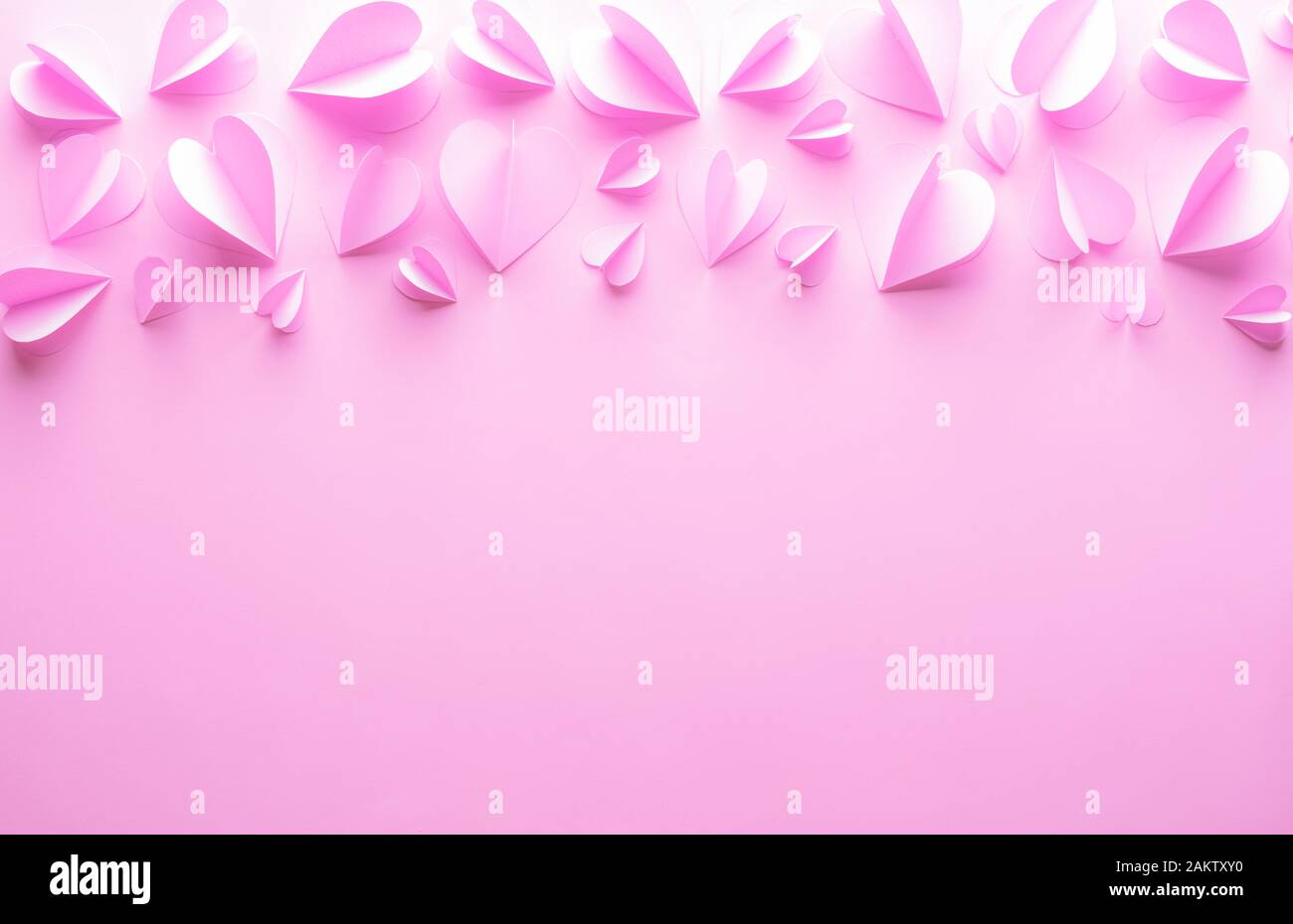 Backgrounds for Valentines day with pink hearts on pastel pink paper ...