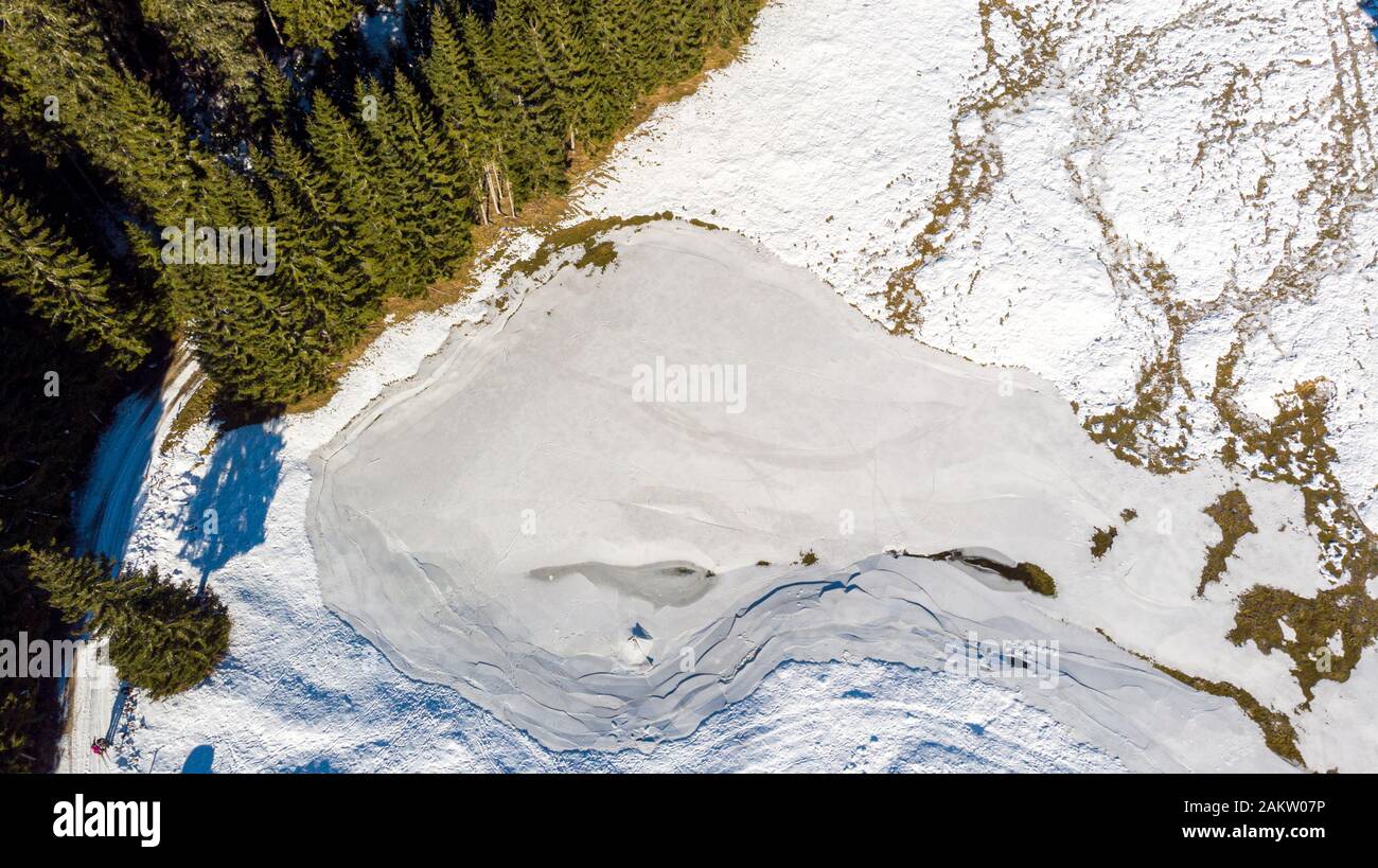 Aerial drop down view of frozen lake Stock Photo - Alamy