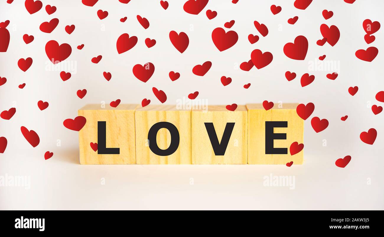 Love message written in wooden blocks. Red heart Stock Photo - Alamy