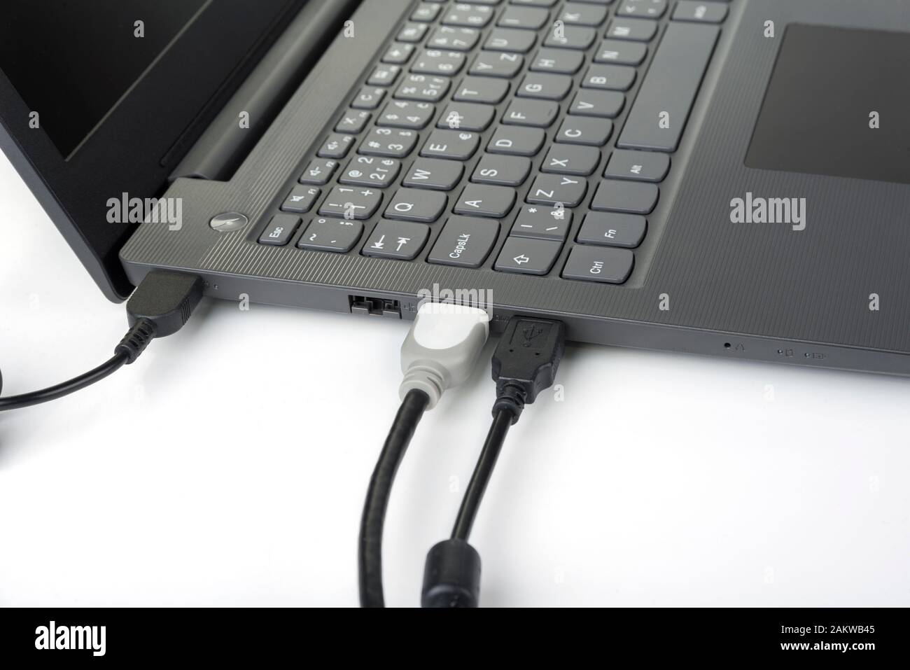 HDMI and USB cable pluged into laptop Stock Photo - Alamy