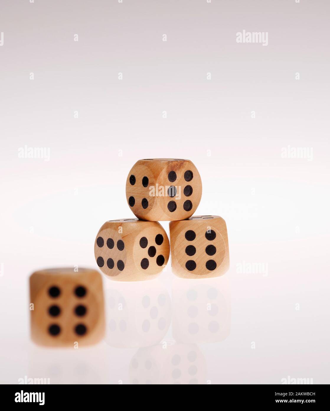 STILL LIFE OF WOODEN DICE ON A WHITE BACKGROUND Stock Photo - Alamy