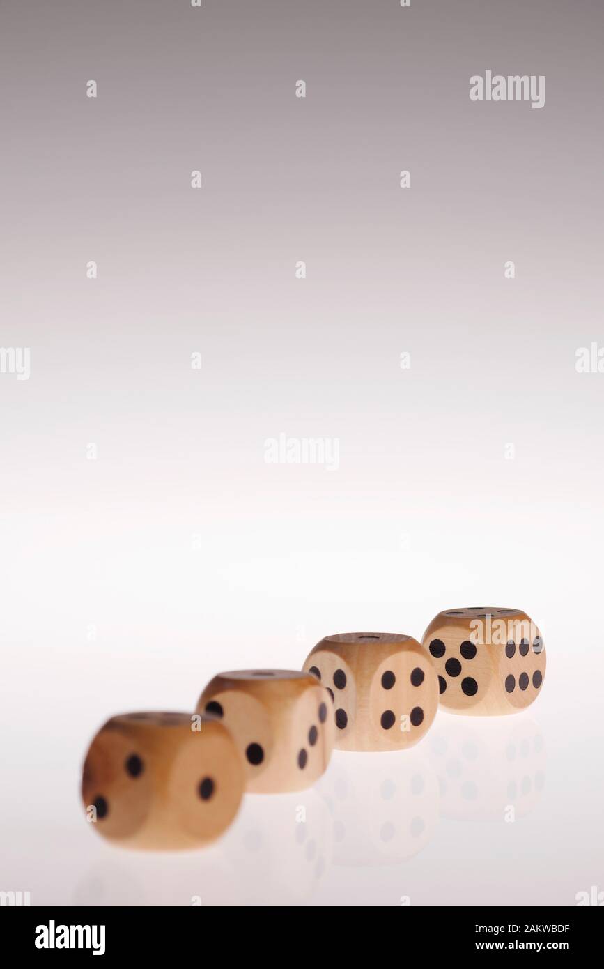 STILL LIFE OF WOODEN DICE ON A WHITE BACKGROUND Stock Photo - Alamy