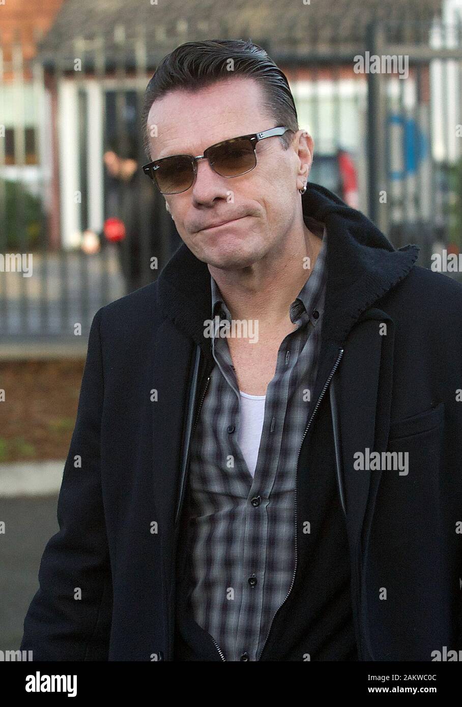 U2 drummer, Larry Mullen, at the funeral of broadcaster and DJ Larry ...