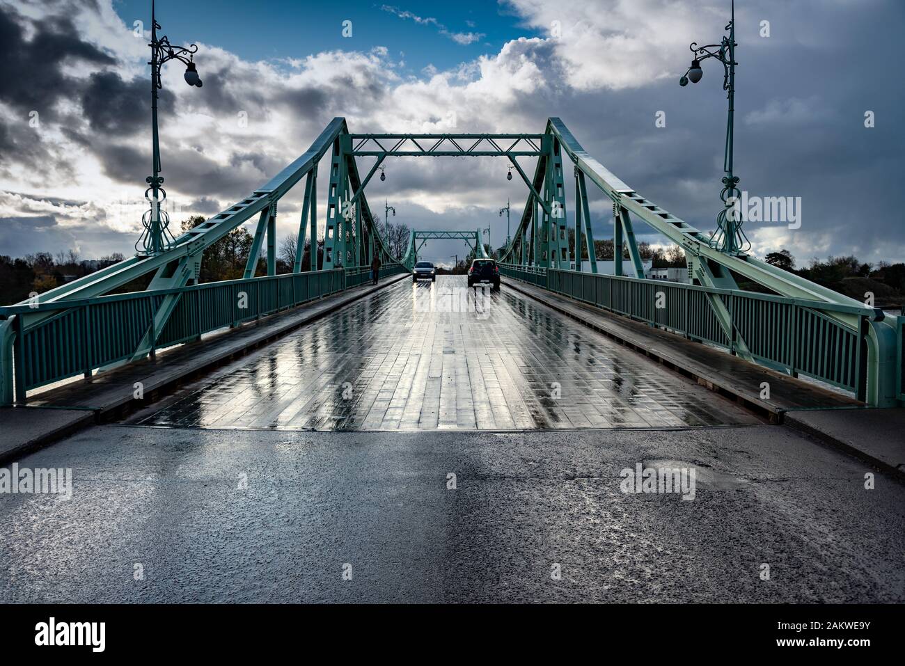 Wooden old bridge after rain Stock Photo - Alamy