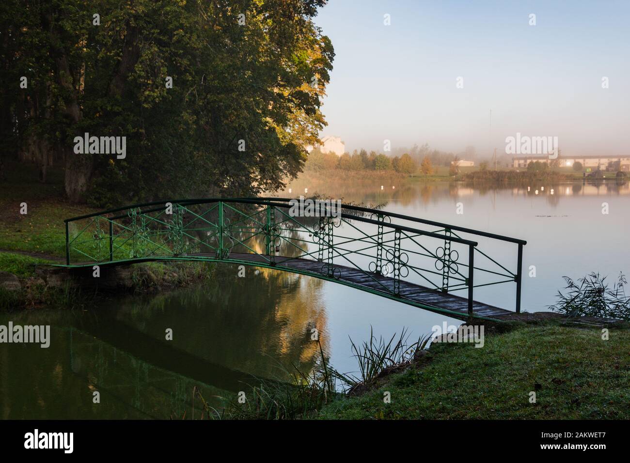 Beautiful arch bridge above small river Stock Photo - Alamy