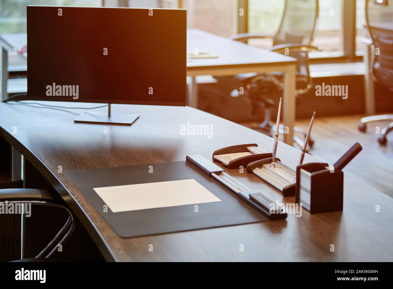 Modern office workplace. Monitor on employee table. Business work place ...