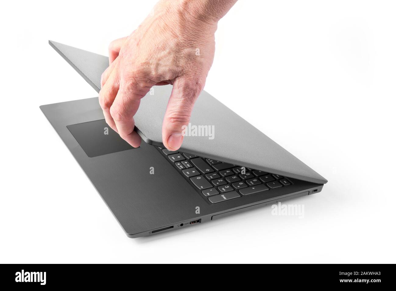 Modern slim lightweight laptop opens with a hand Stock Photo - Alamy