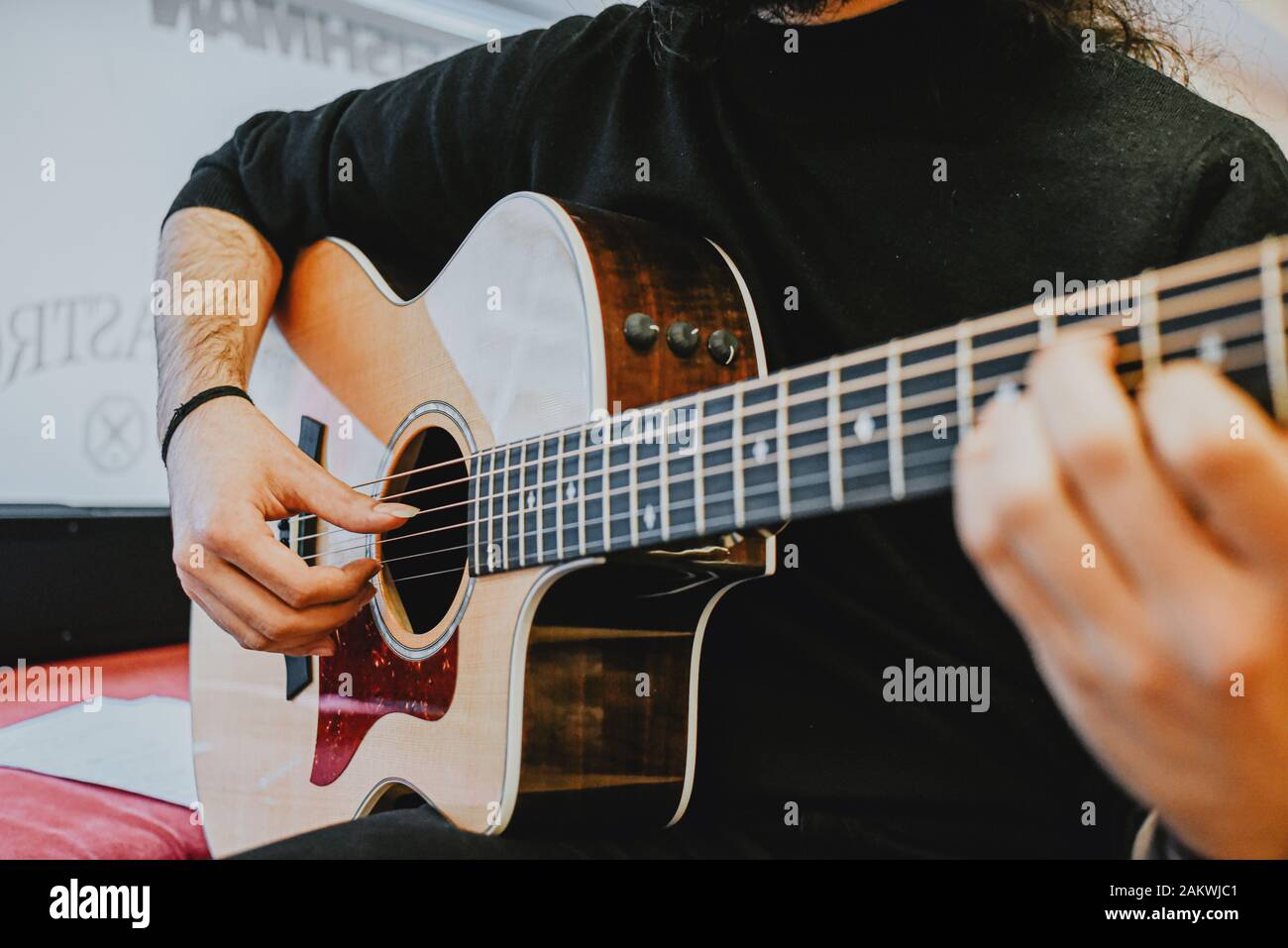 Hands on guitar strings hi-res stock photography and images - Alamy