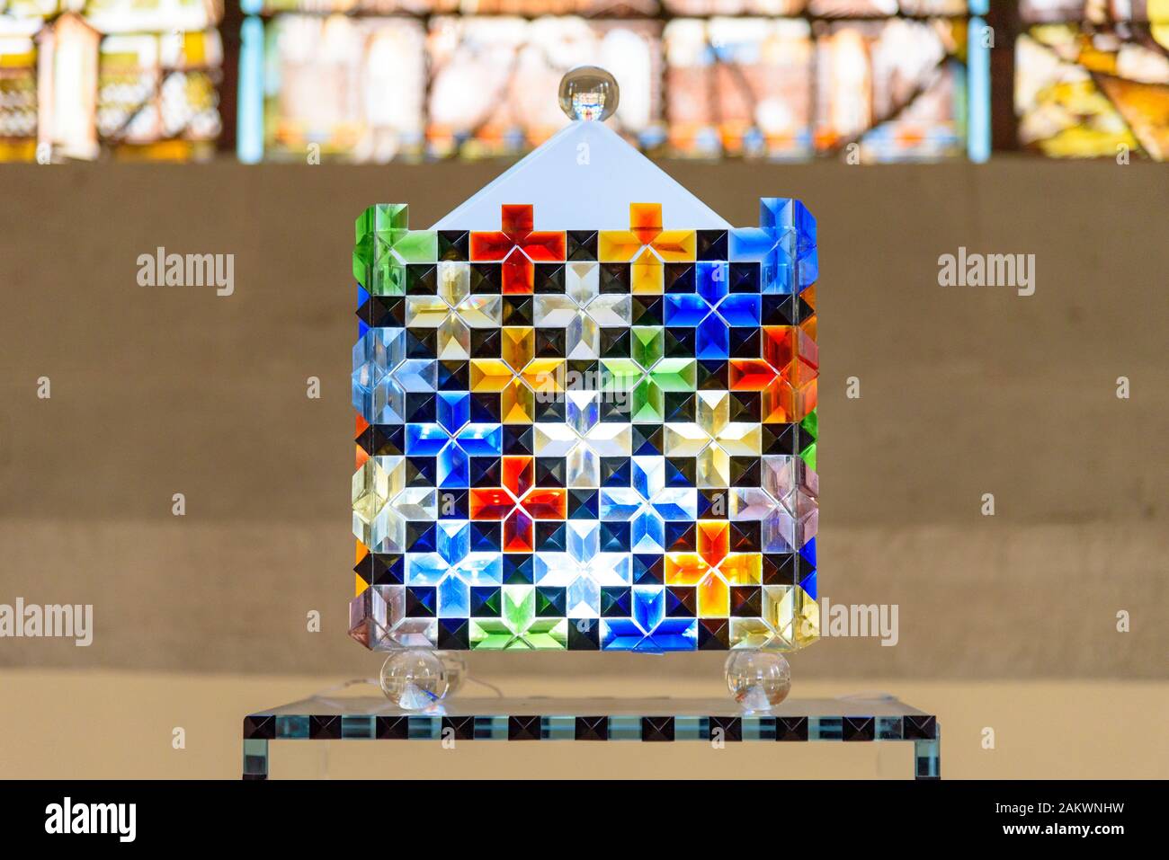 Christian religious symbol with colorful crosses on top of glass table ...