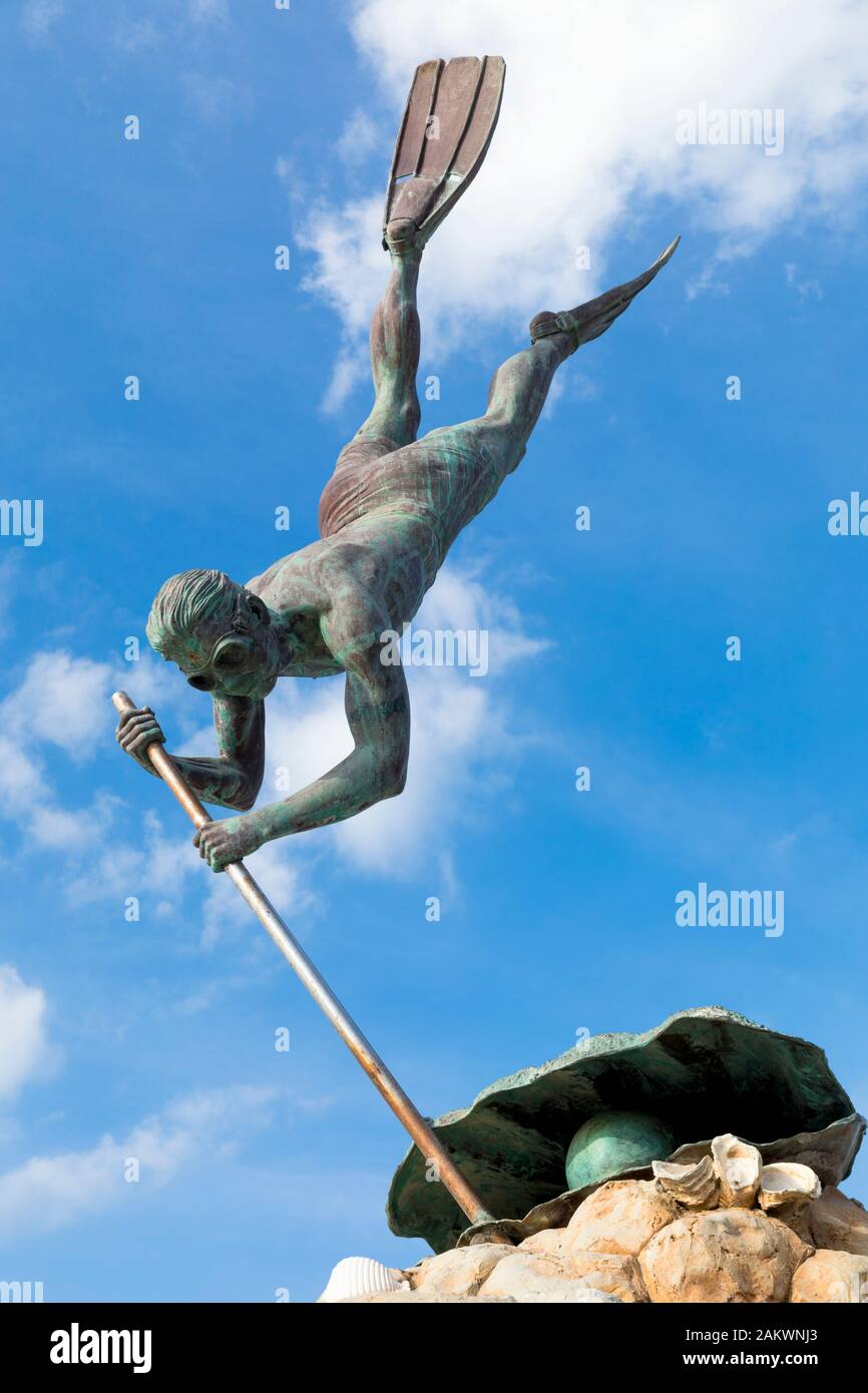 Mexico, Nayarit, Bucerias, The sculpture is the figure of a man diving ...