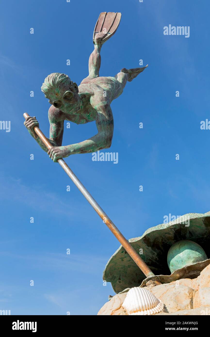 Mexico, Nayarit, Bucerias, The sculpture is the figure of a man diving ...