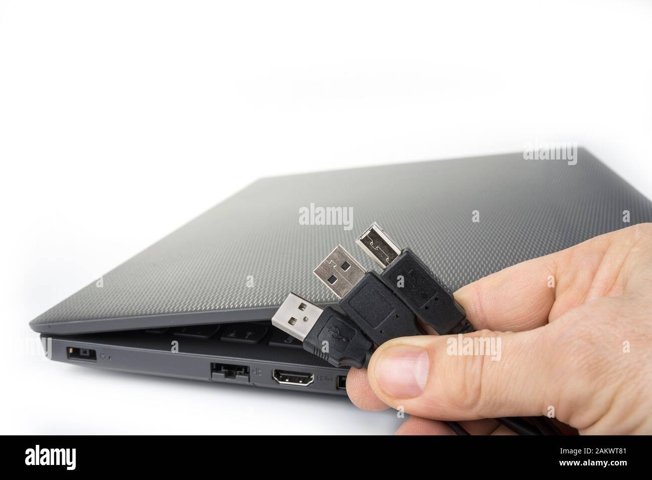 USB and power source plug of modern slim lightweight laptop Stock Photo ...