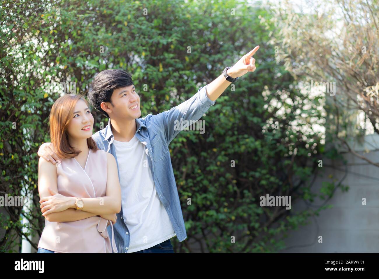 Person pointing at two others hi-res stock photography and images - Alamy