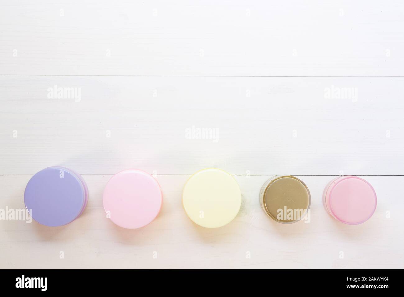 cosmetic and skin care product on white wood table, beauty with ...