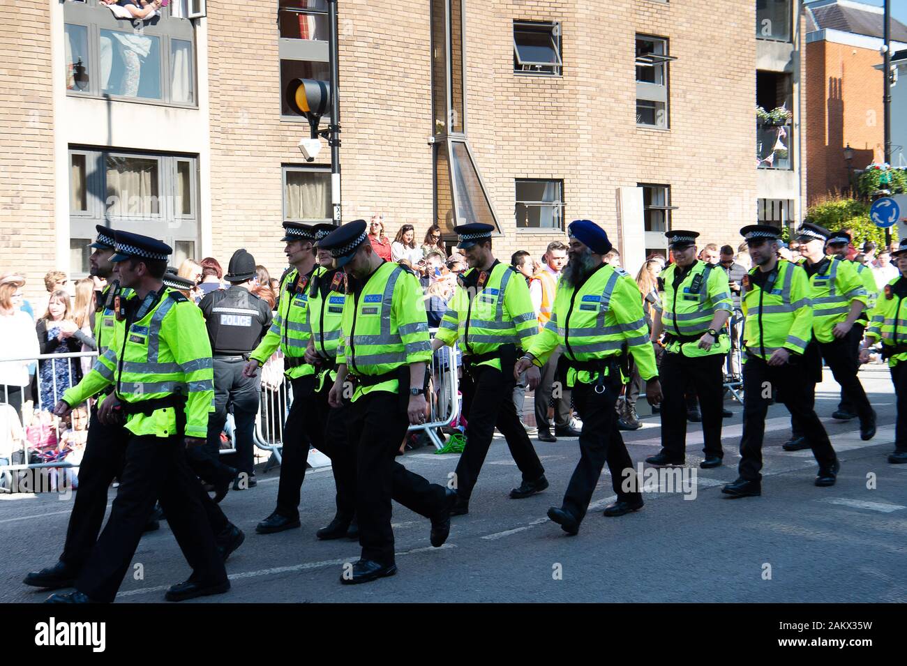 Royal Wedding Day, Windsor, Berkshire, UK. 19th May, 2018. Police march ...