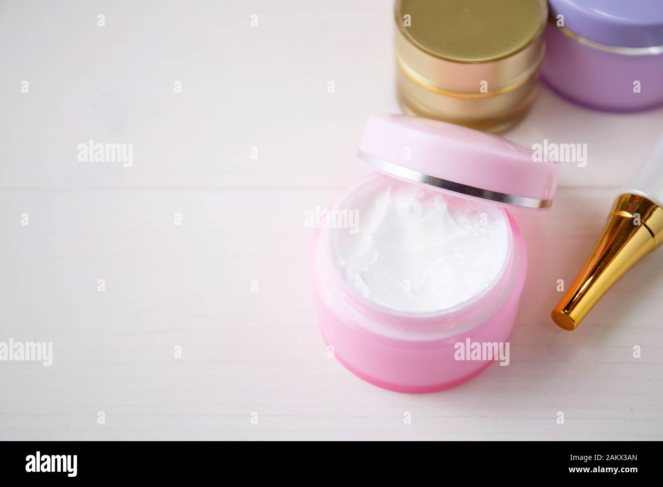 cosmetic and skin care product on white wood table, beauty with ...