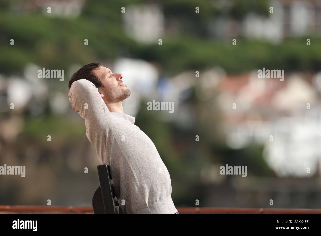 Man resting head on arms hi-res stock photography and images - Alamy