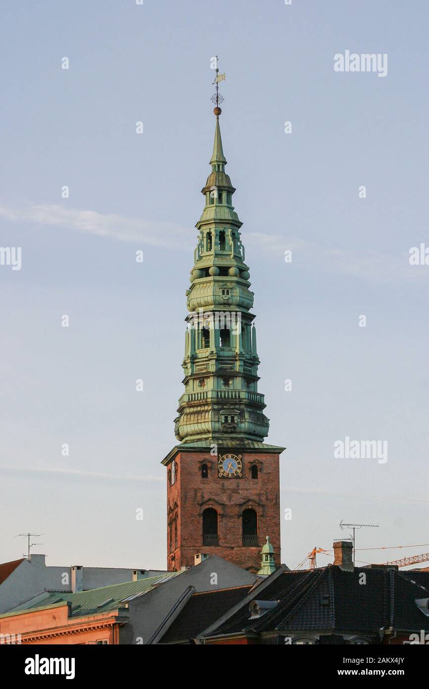 Landmark spire in Copenhagen, clock-tower and green copper spire of ...