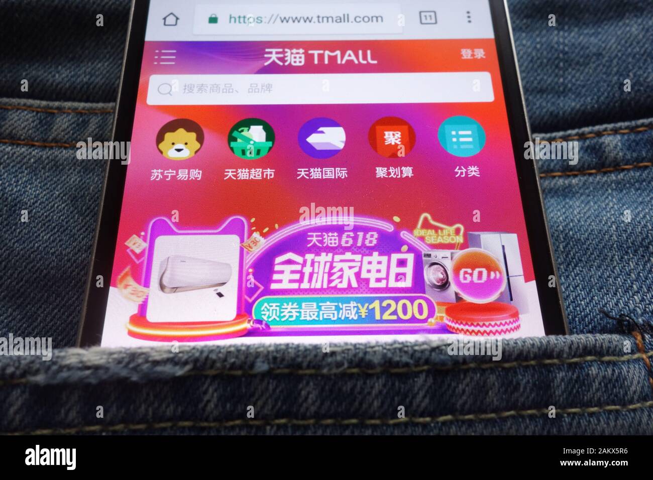 TMall website displayed on smartphone hidden in jeans pocket Stock ...