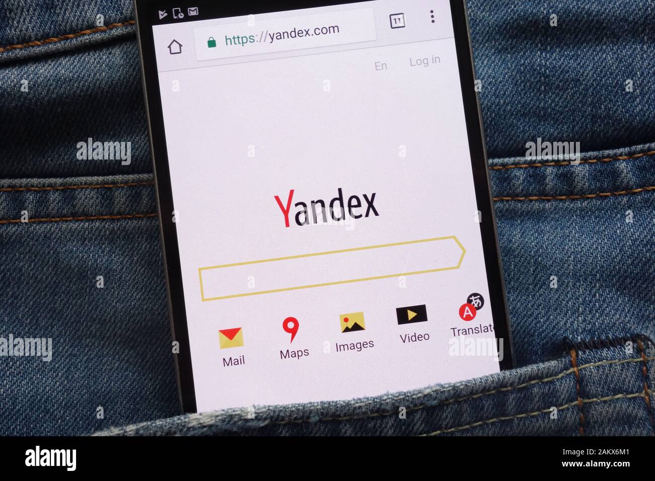 Yandex website displayed on smartphone hidden in jeans pocket Stock ...