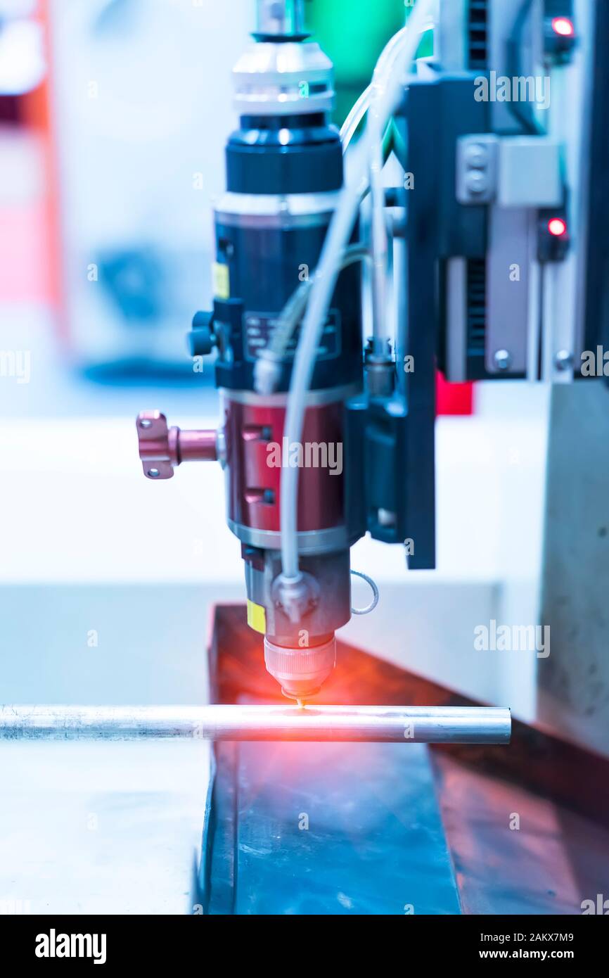 laser cutting machine controller by CNC program Stock Photo - Alamy