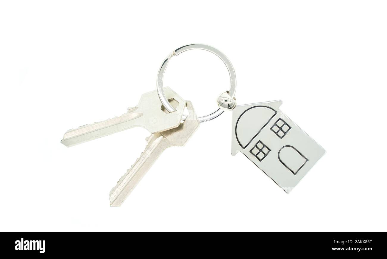 key chain with house symbol and keys on white background,Real estate ...