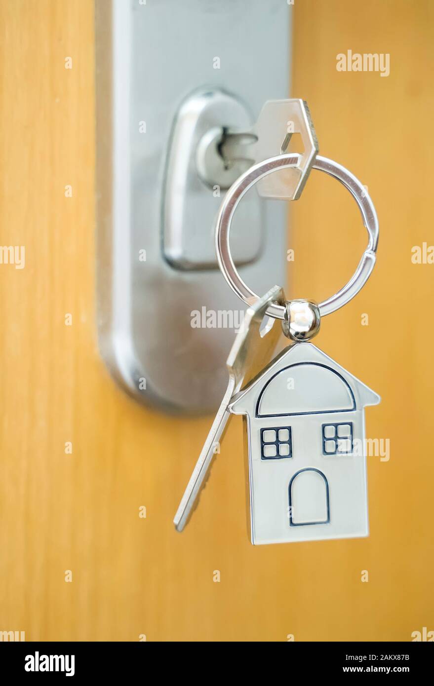 House key in door keyring hi-res stock photography and images - Alamy