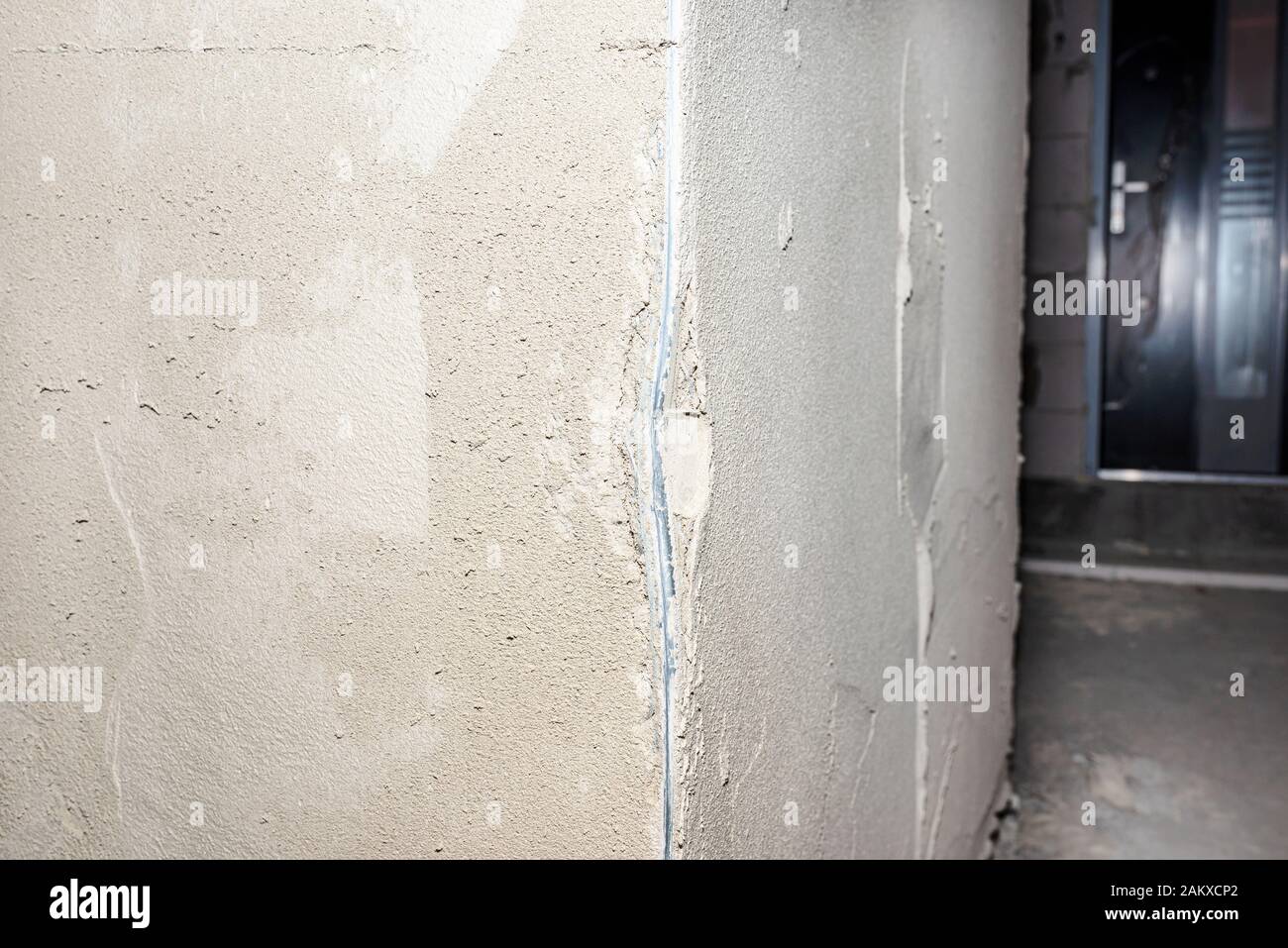 Damaged corners of plastered walls, visible aluminum corner Stock Photo ...