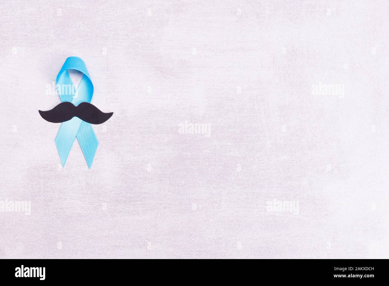 Healthcare and medicine concept - blue prostate cancer awareness ribbon ...